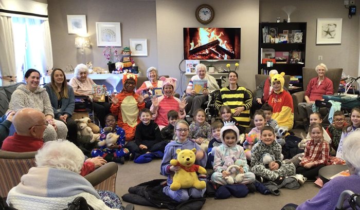 Horley care home residents read bedtime stories to local children | Care UK